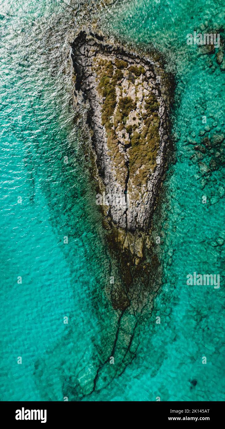 Aerial bird's eye view depicting beautiful deep blue, turquoise waters ...