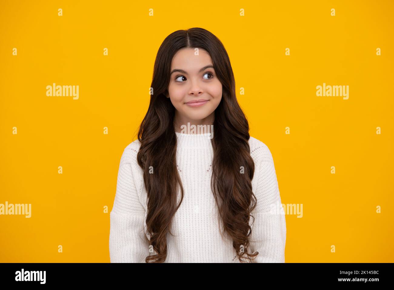 Funny face. Little kid girl 12,13, 14 years old on isolated background ...