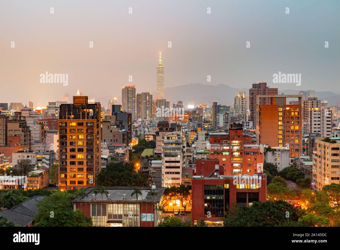 Twilight aerial view of the Zhongzheng District cityscape at Taipei ...