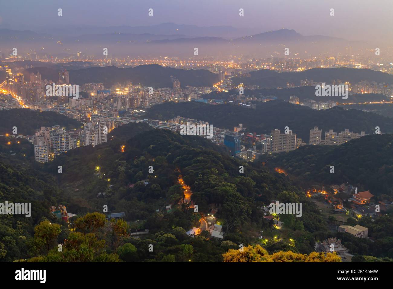 Sunset aerial view of the Neihu District cityscape from Bishanyan at ...