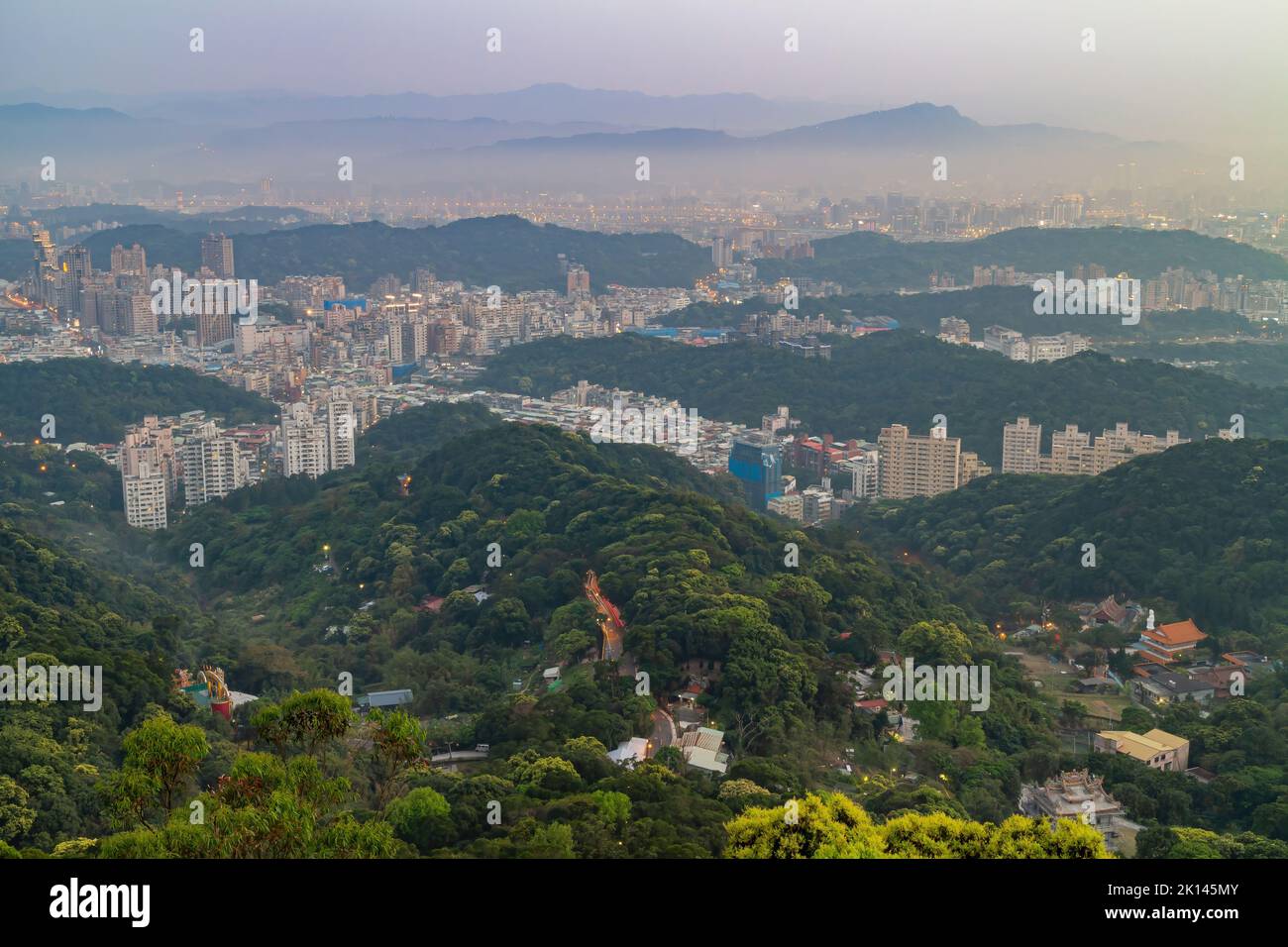 Sunset aerial view of the Neihu District cityscape from Bishanyan at ...
