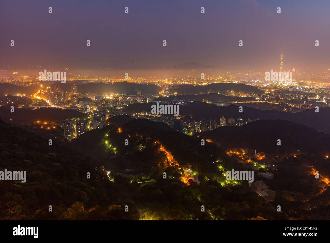 Twilight aerial view of the Neihu District cityscape from Bishanyan at ...