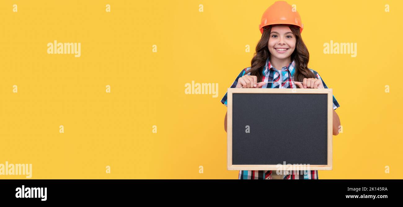 cheerful teen girl laborer hold blackboard. child advertising labor day ...