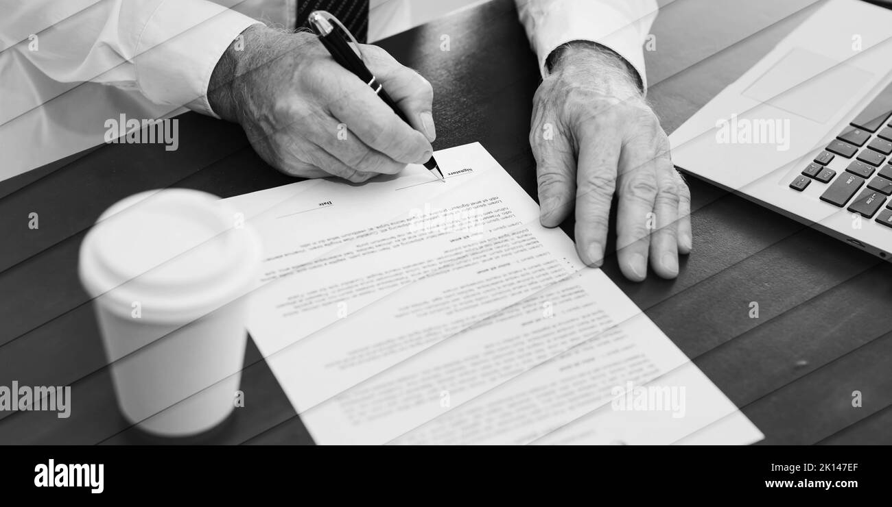 Hand of businessman signing a contract (lorem ipsum text used ...