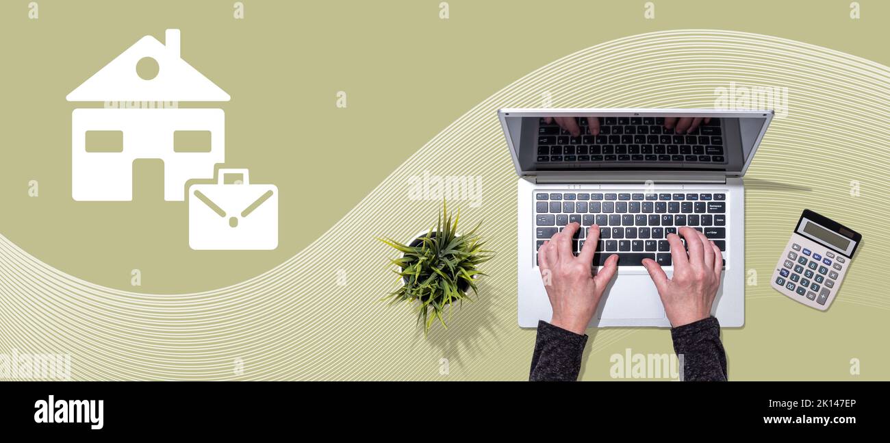 Top view of hands using laptop with symbol of work from home concept ...