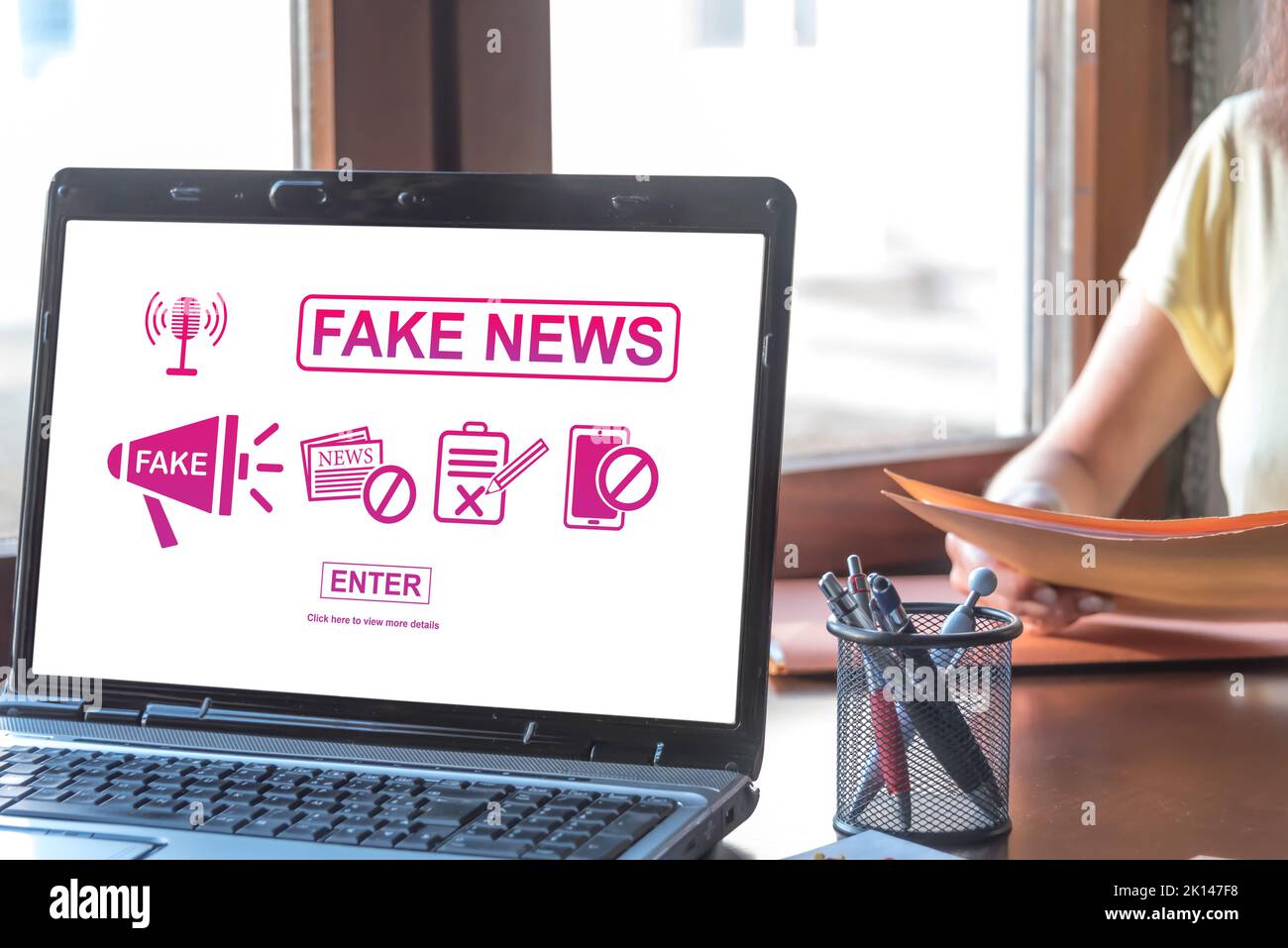 Laptop screen displaying a fake news concept Stock Photo - Alamy