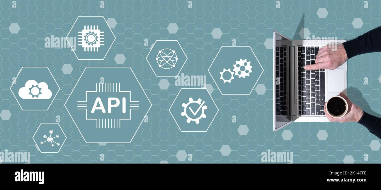 Top view of hands using laptop with symbol of api concept Stock Photo ...