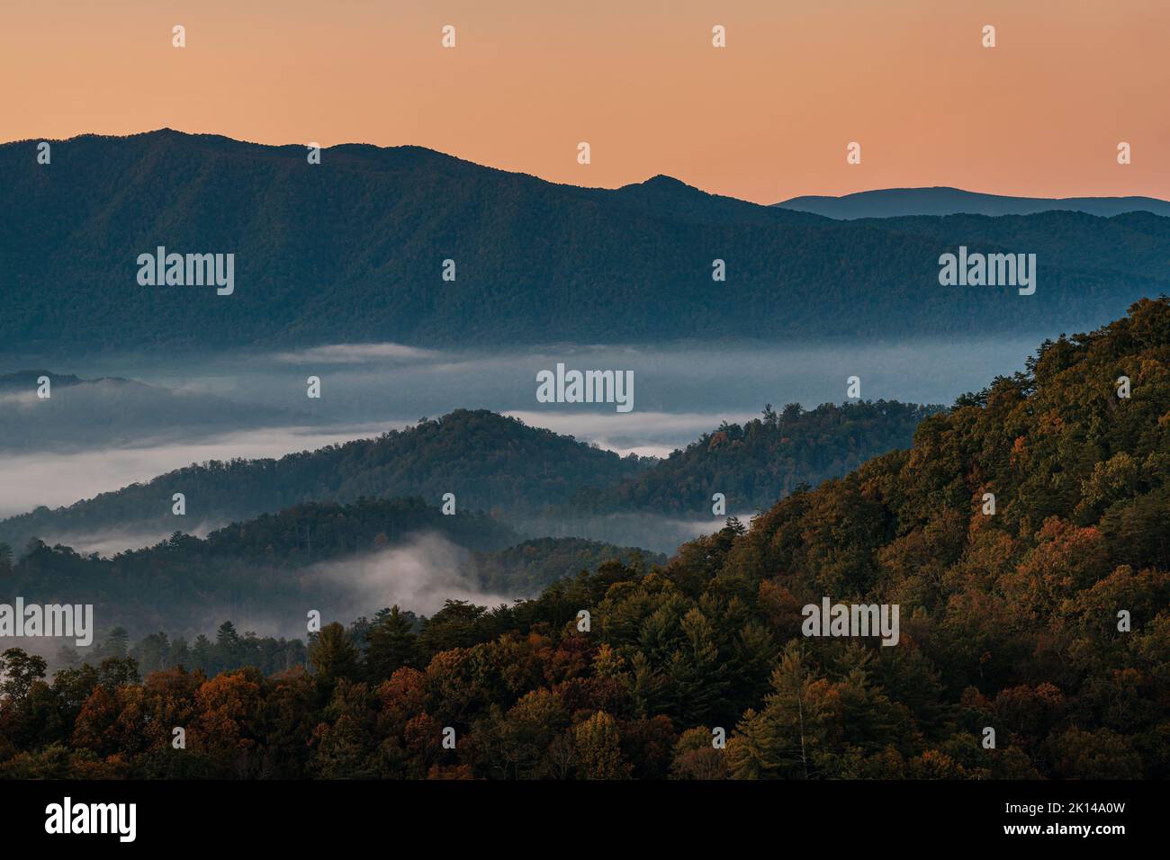 Sunrise light colors the sky from Foothills Parkway, Great Smoky ...
