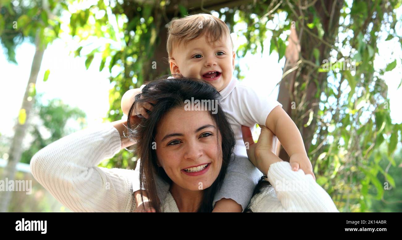 Mother and baby affectionate relationship. Infant boy on parent ...