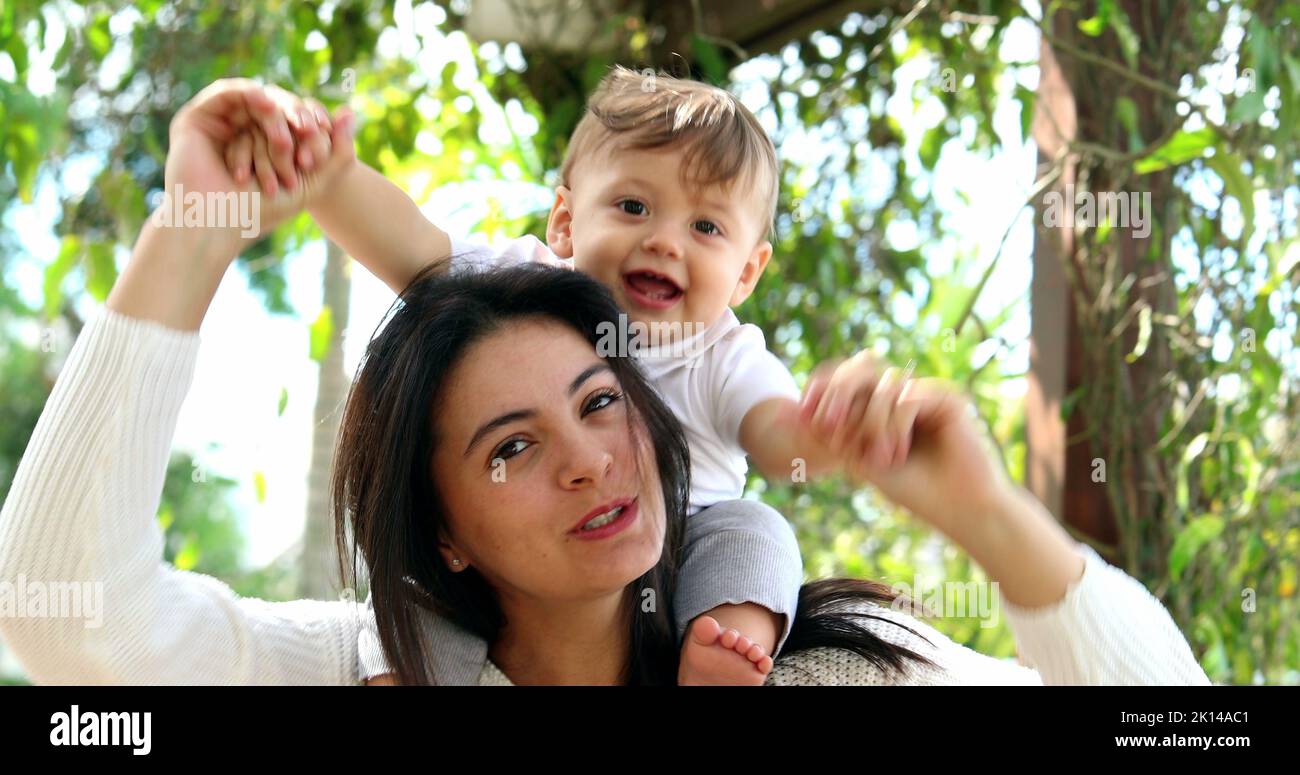 Mother and baby affectionate relationship. Infant boy on parent ...