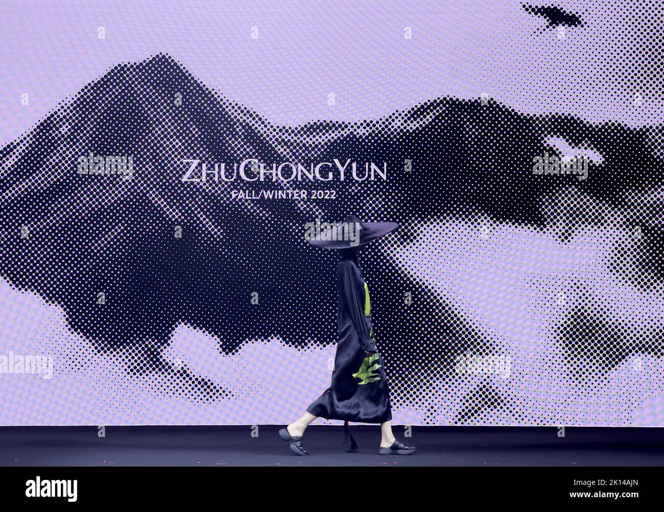 Beijing, China. 15th Sep, 2022. A model presents a creation during the ...