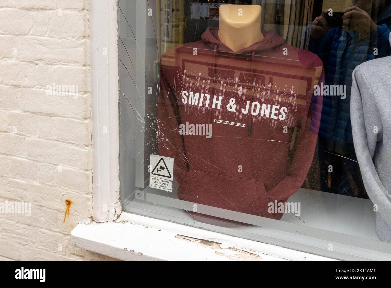 Broken shop window in Cromer Norfolk England Stock Photo - Alamy