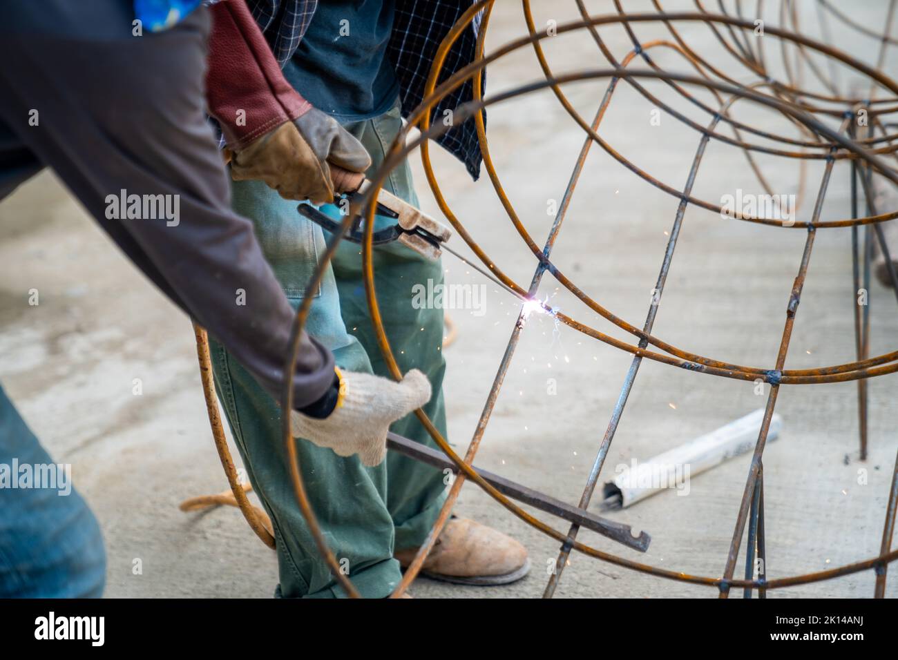 Blacksmith Technicians are welding several curve wires to form a ...