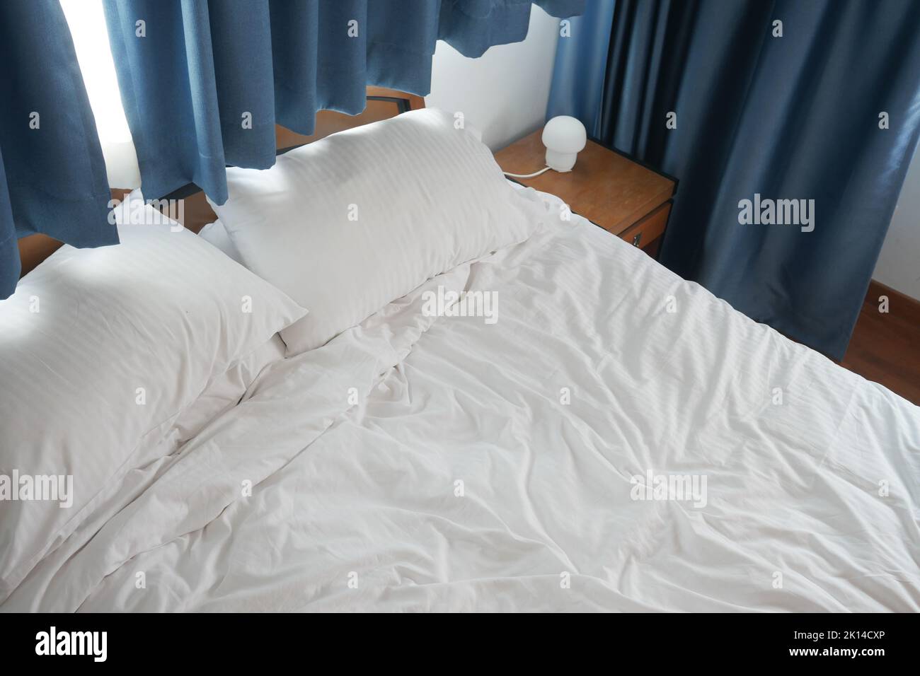 top view of messy bed in early morning , messy bed after waking up ...