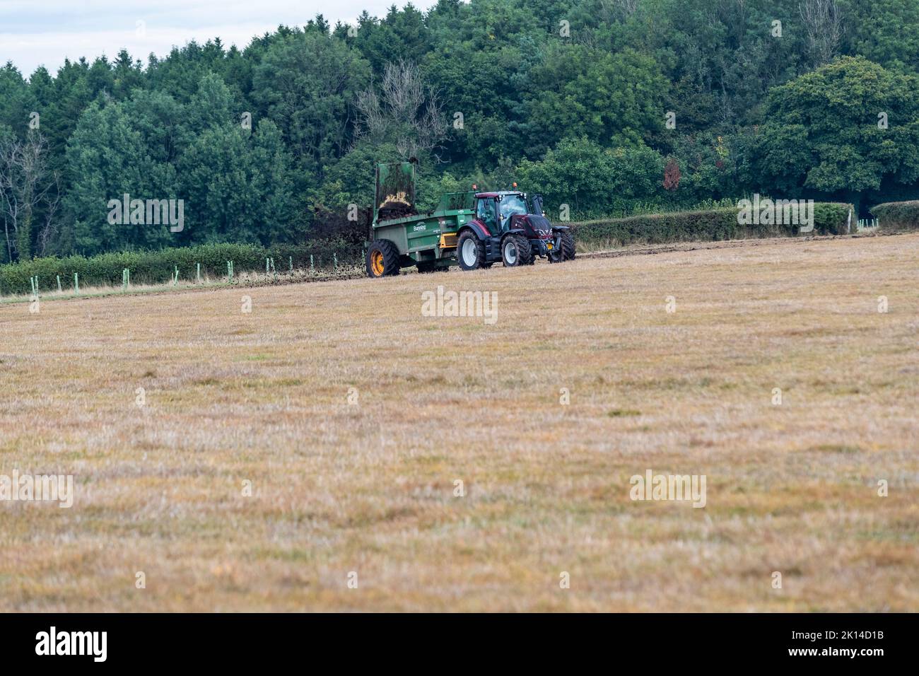 John deere tractor spreading muck hi-res stock photography and images ...