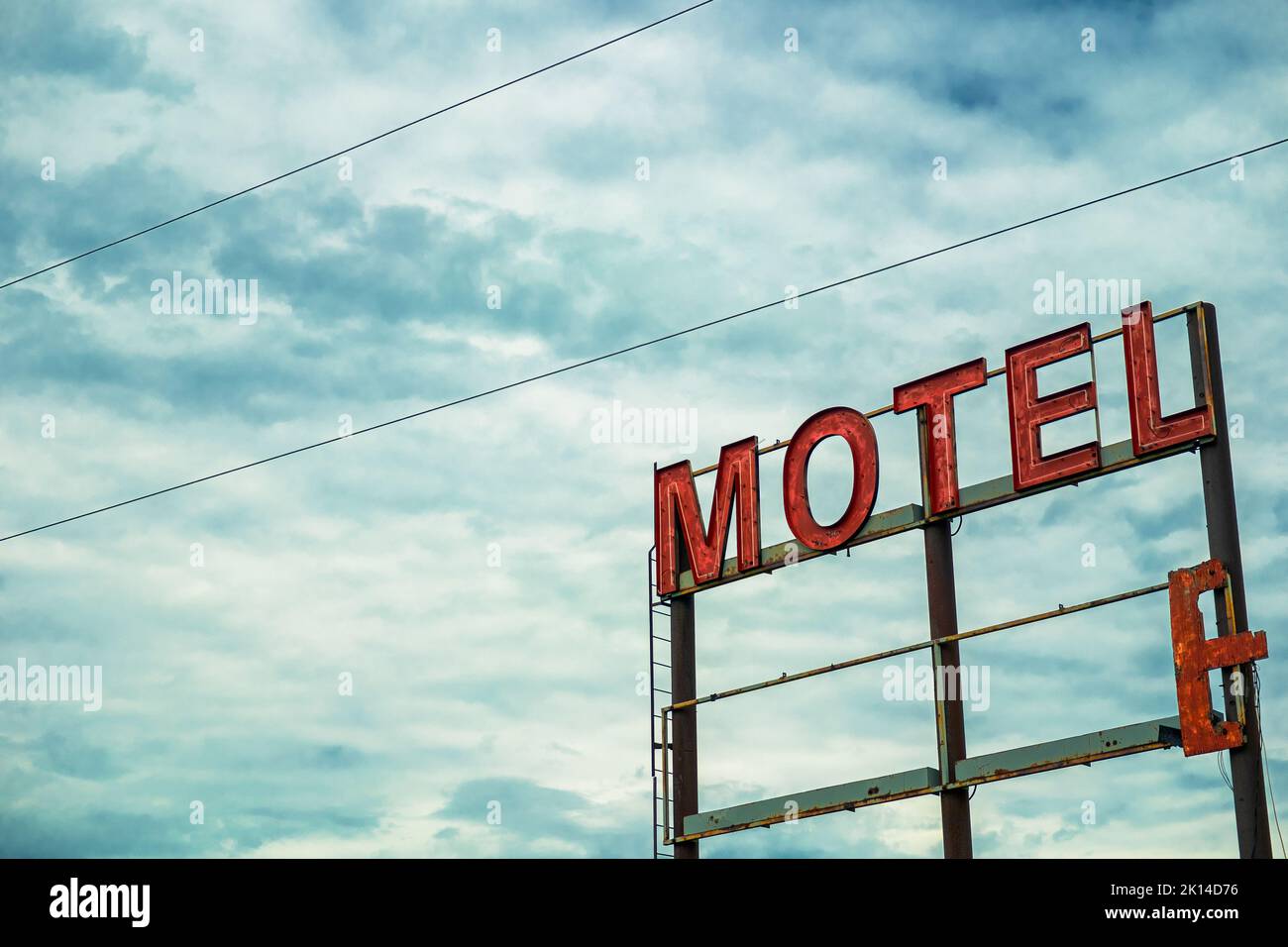An abandoned motel sign on a cloudy day Stock Photo - Alamy