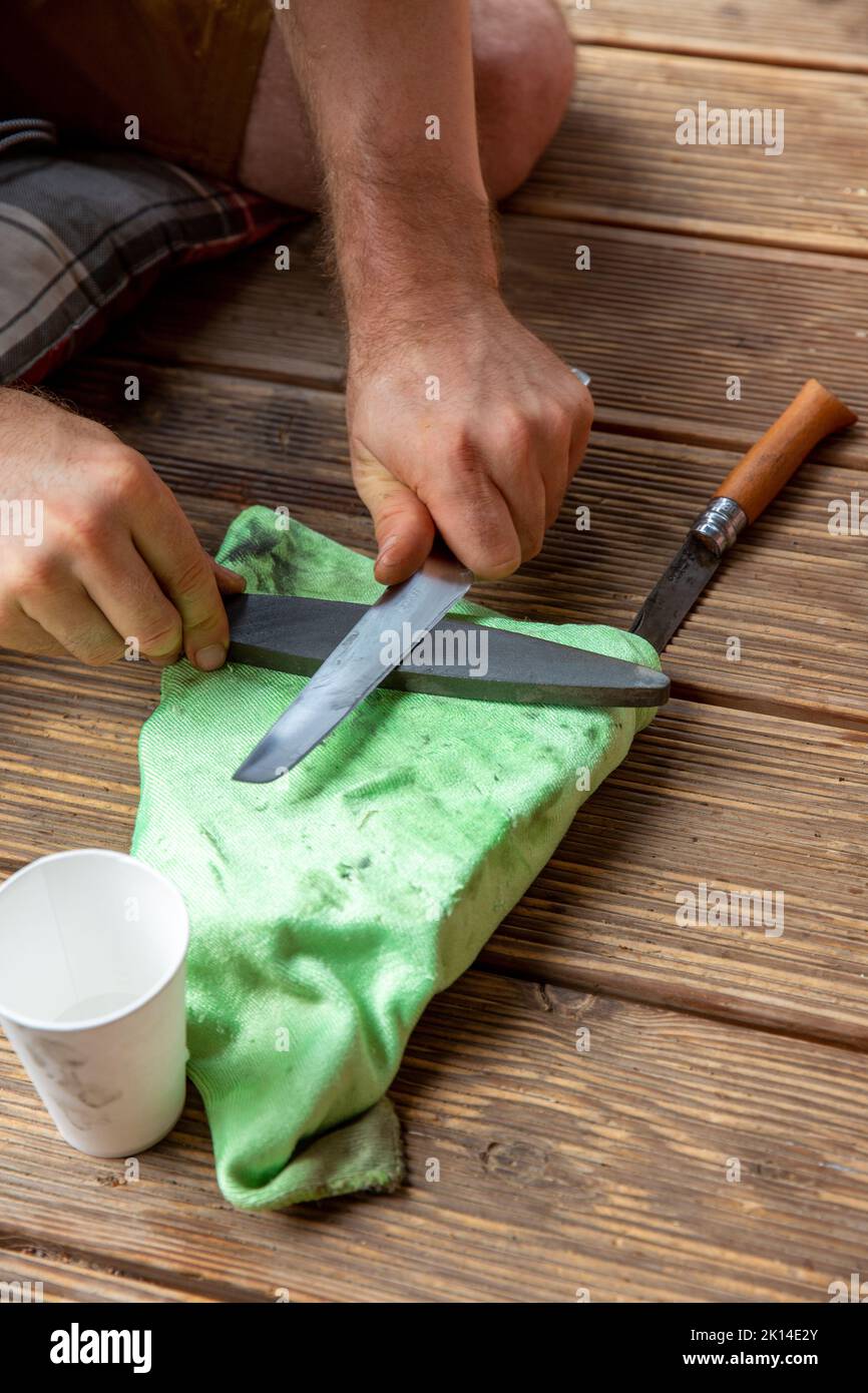 Man sharpening knife hi-res stock photography and images - Alamy
