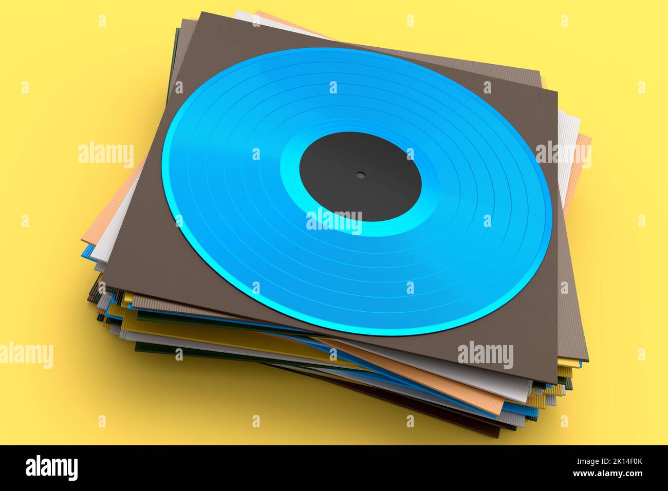 Black vinyl LP record with heap of covers isolated on yellow background ...