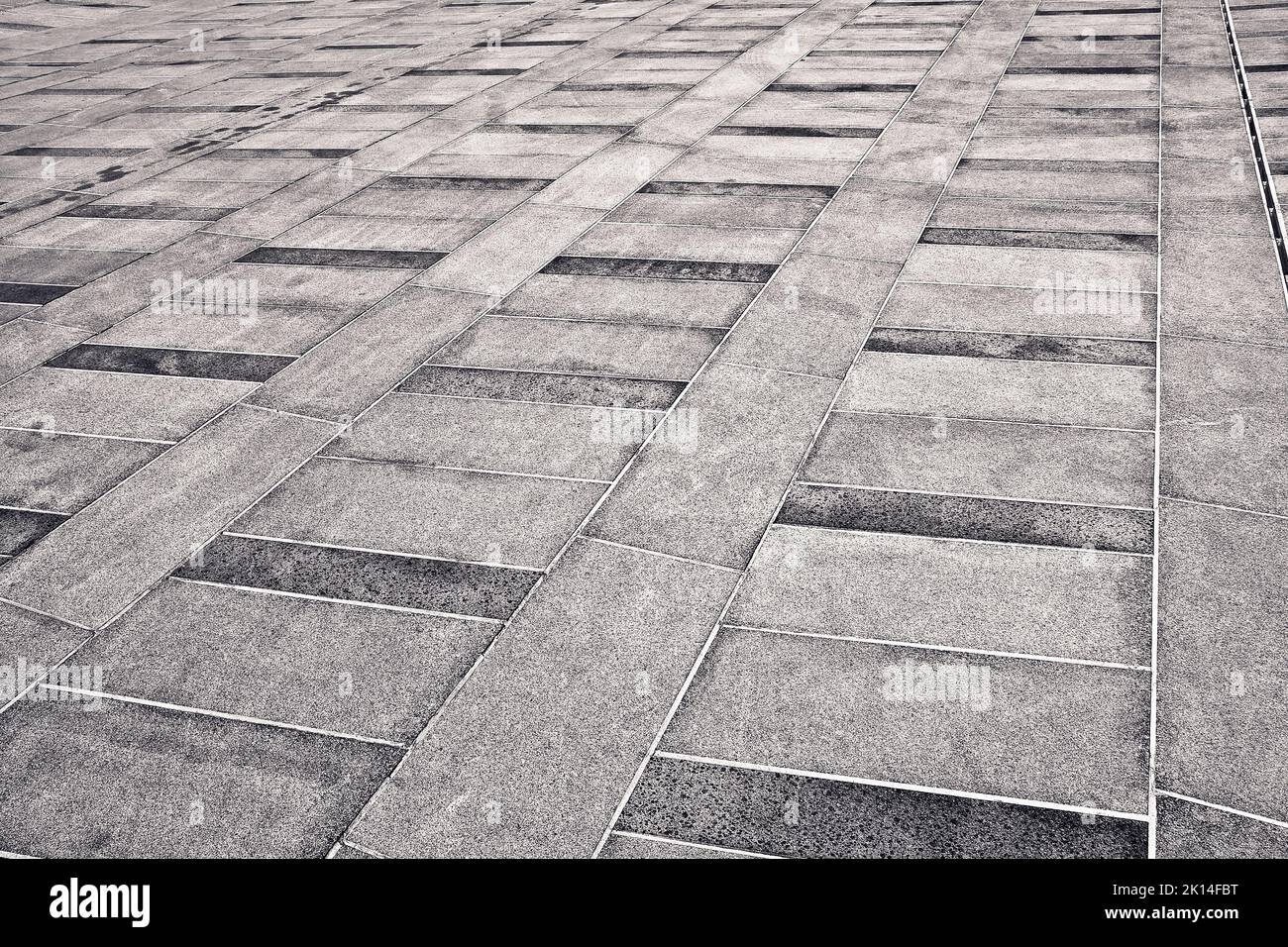 New paving made with stone blocks of rectangular shape in a pedestrian ...