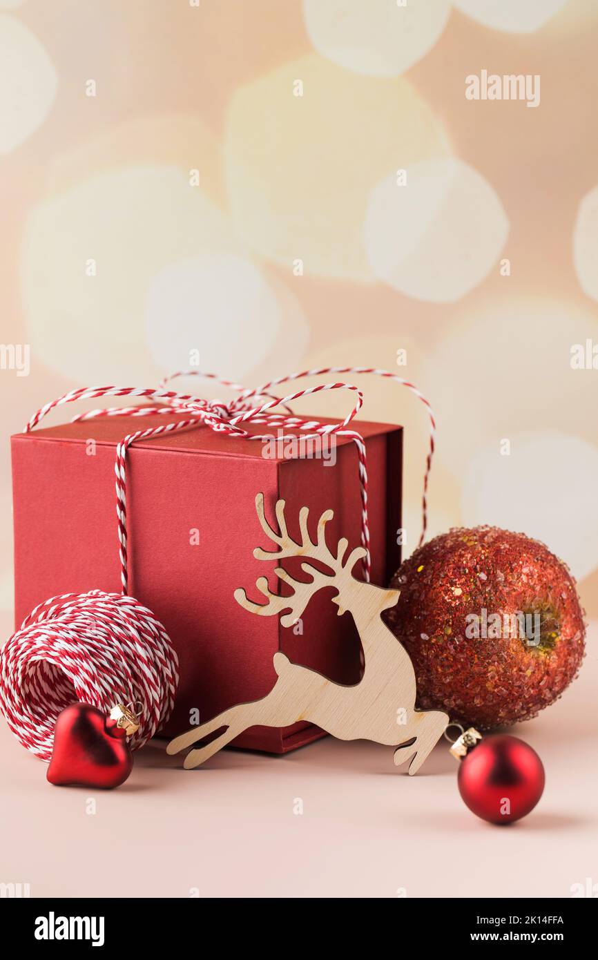 Christmas composition with gift box, christmas decorations, deer and bokeh Stock Photo - Alamy