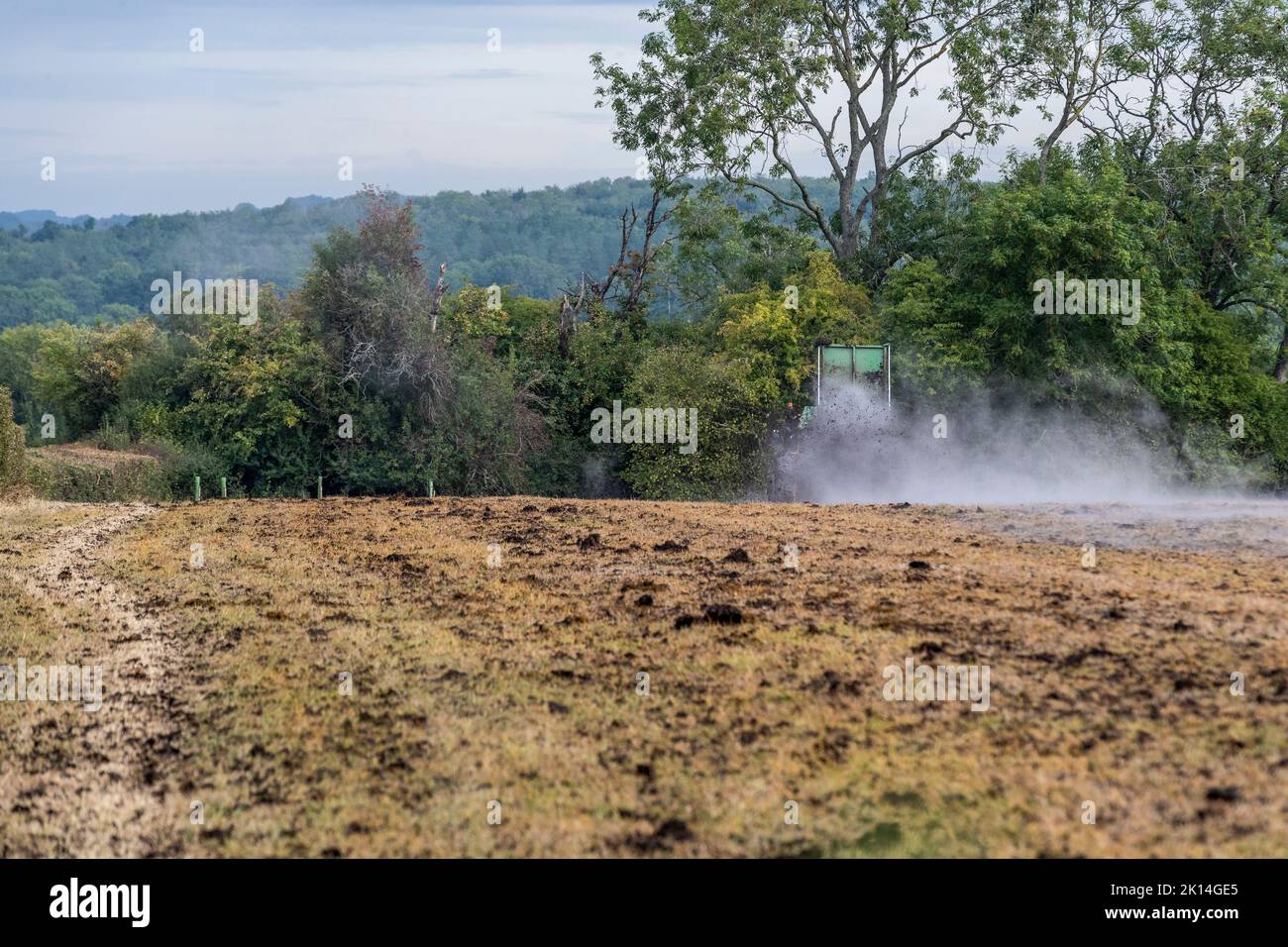 Modern agriculture. Muck spreading prior to ploughing Stock Photo - Alamy