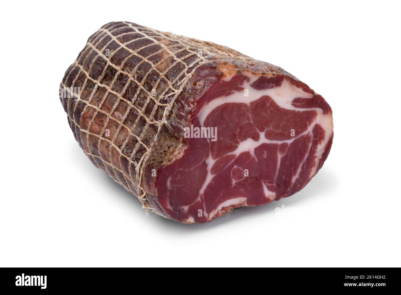Piece of traditional Croatian dried pork neck, pork collar bacon, close ...