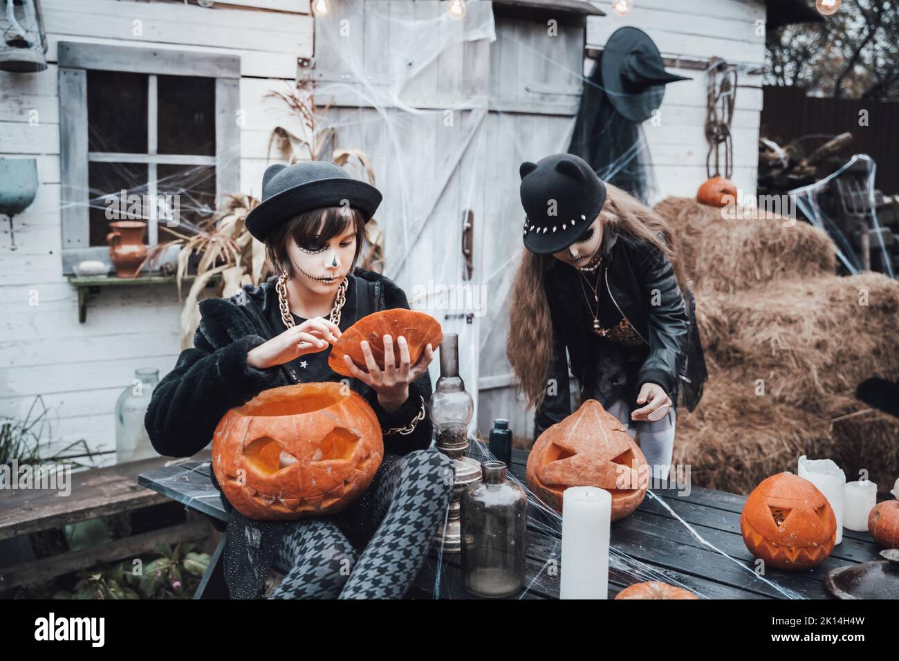 Beautiful scary little girls celebrating halloween. Terrifying black ...