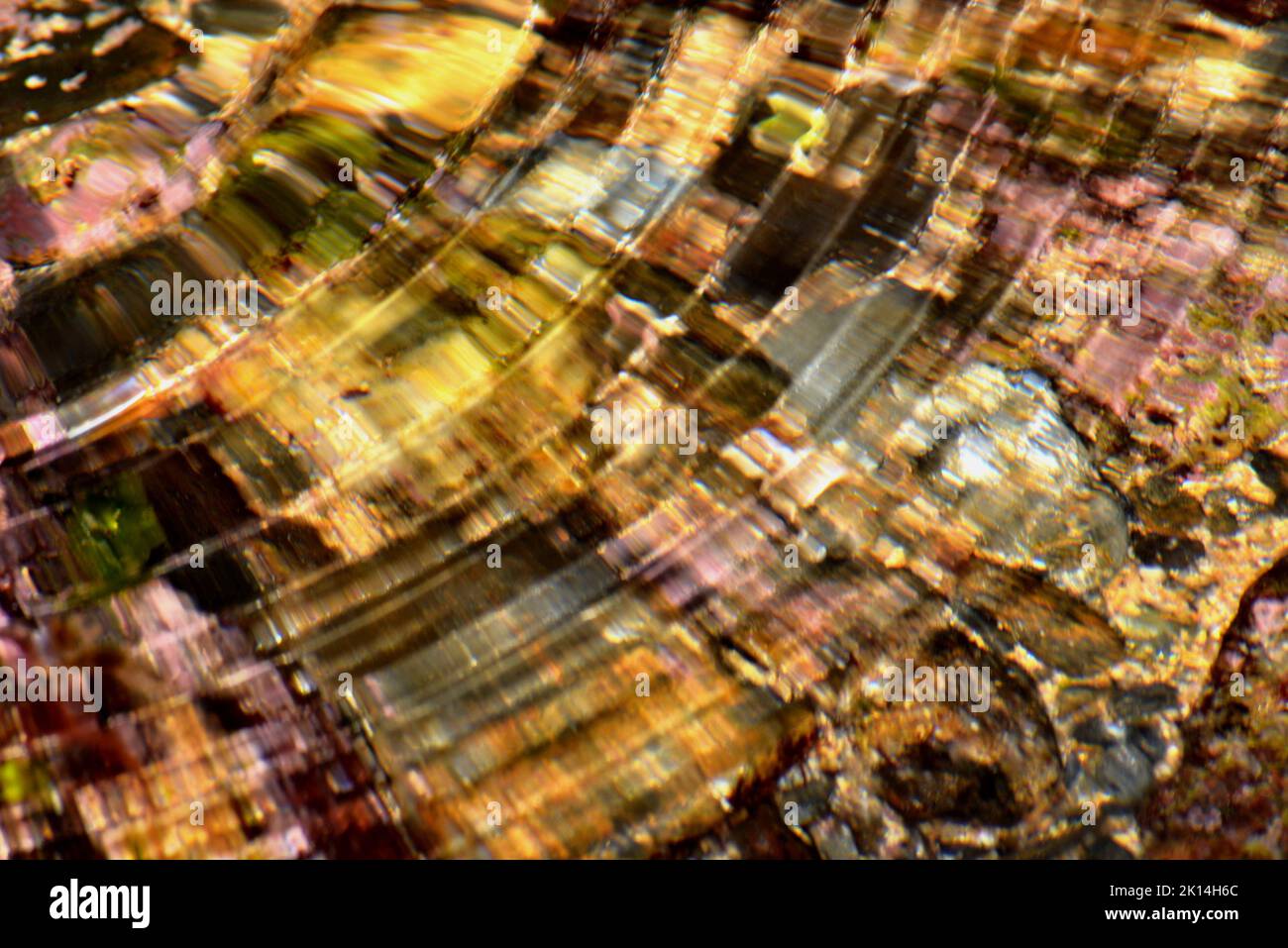 Concentric waves on the water surface, coming from the corner, with ...