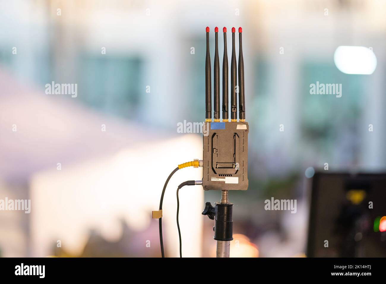 Live broadcast antenna is located outdoors at night that background is ...