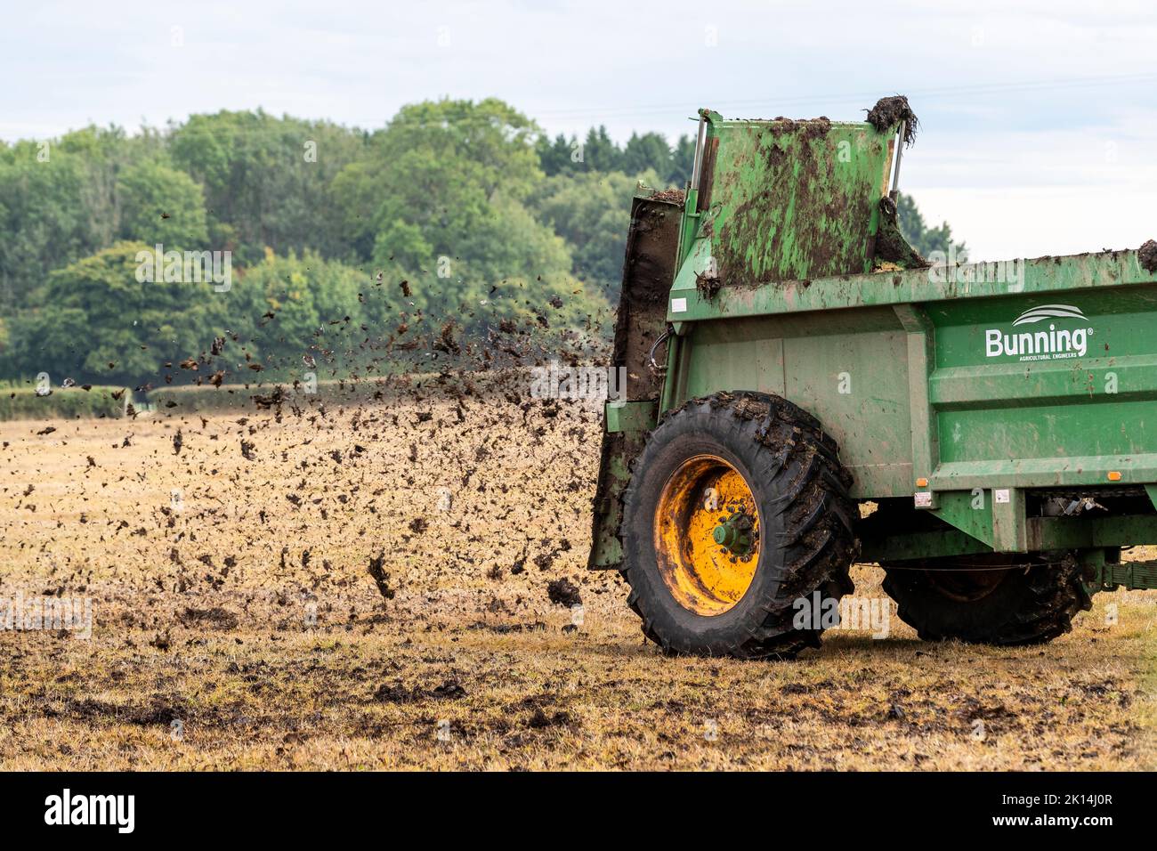 John deere tractor spreading muck hi-res stock photography and images ...