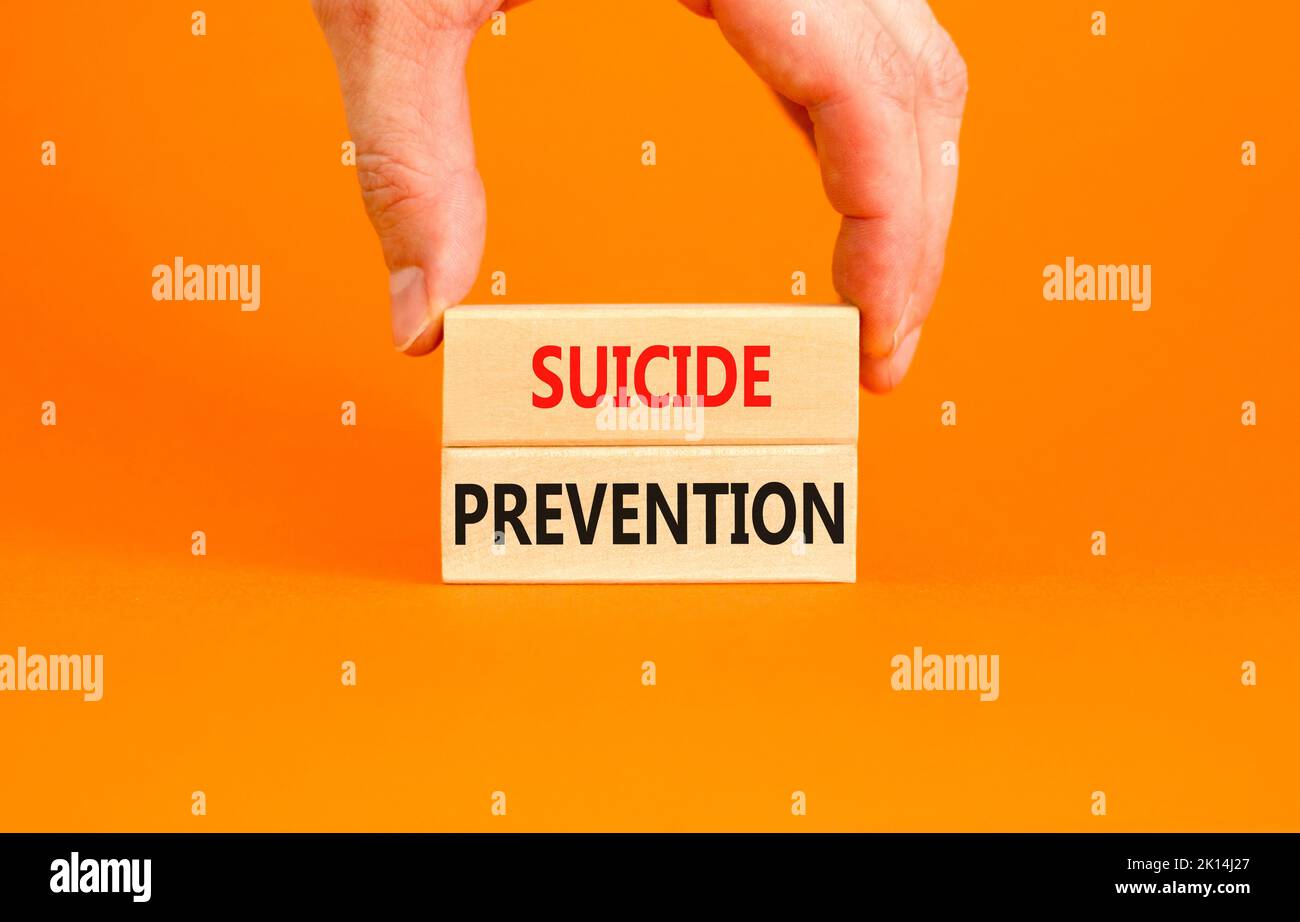 Suicide prevention symbol. Concept words Suicide prevention on wooden ...