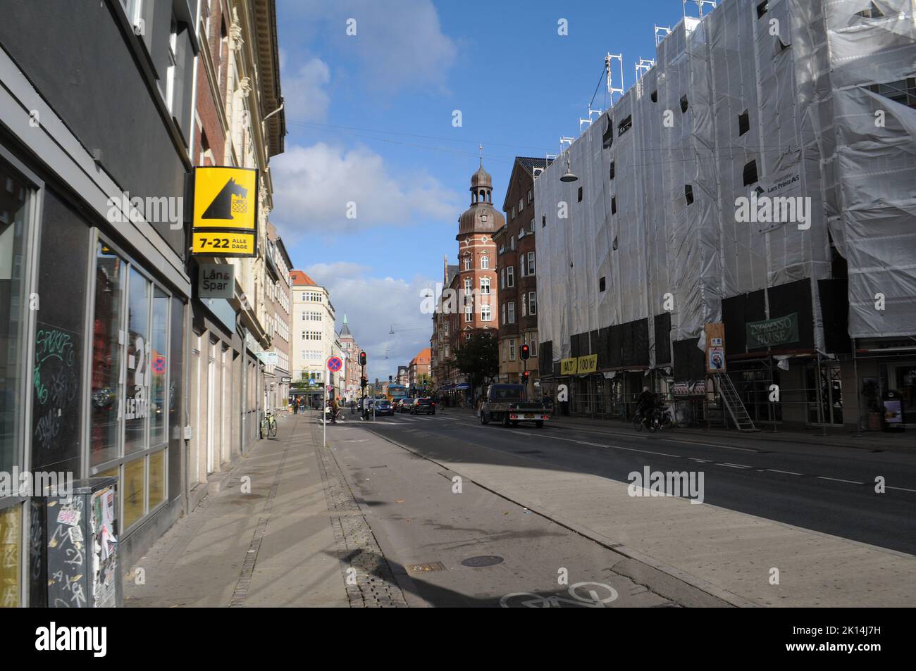 Copenhagen -Denmark -15 septmeber 2022-Perosn rides bike on Amgerbrogade indanish capital ...