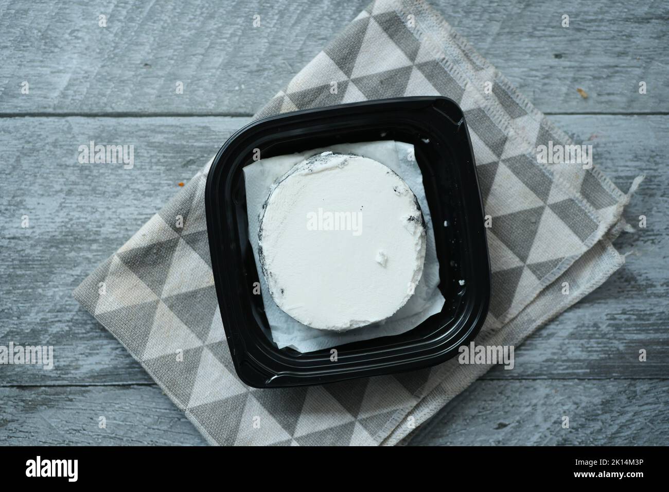 top view of fresh goat cheese on wooden background Stock Photo - Alamy