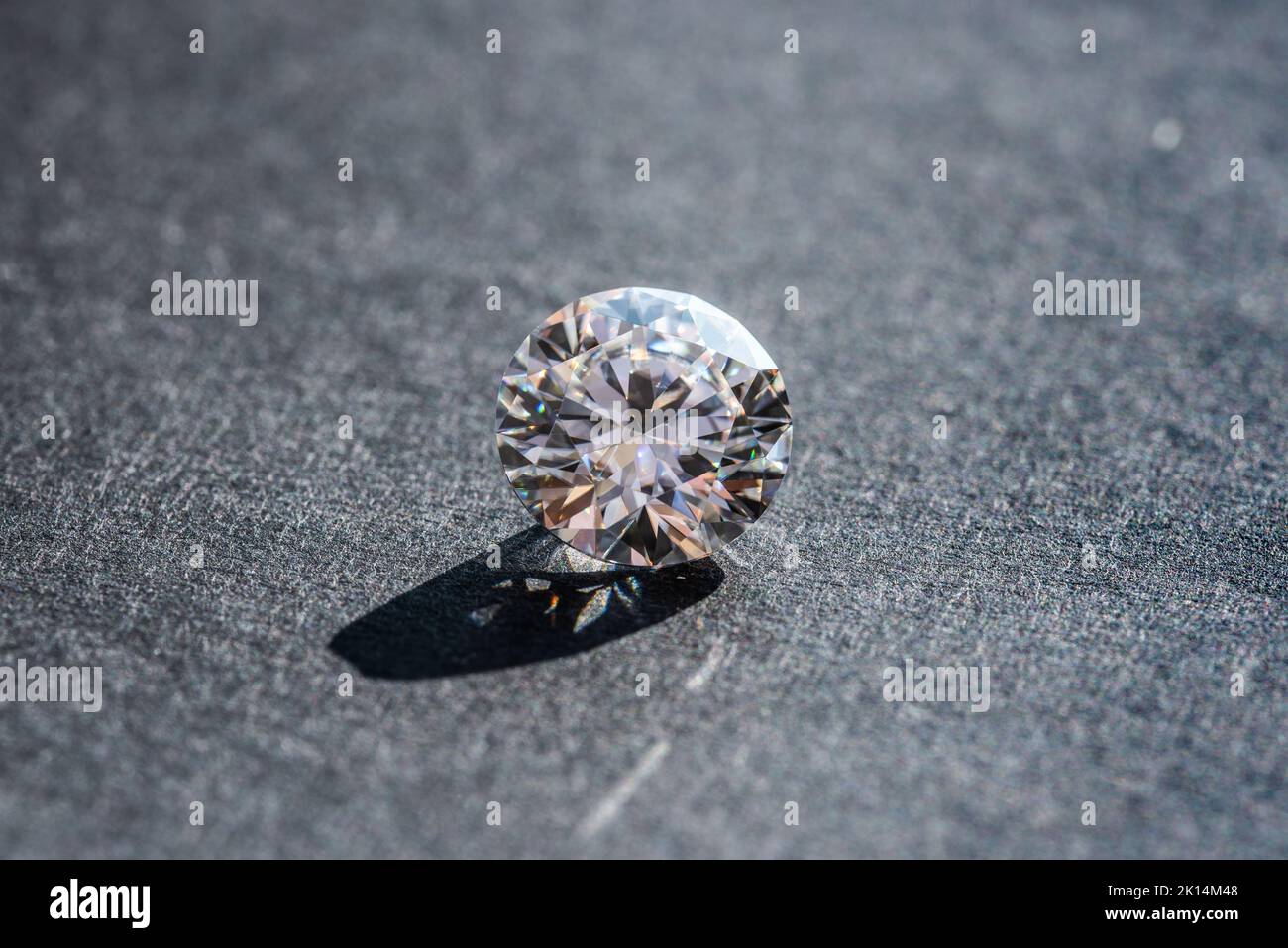 Luxury Diamond gemstone on Dark grey Background Stock Photo - Alamy
