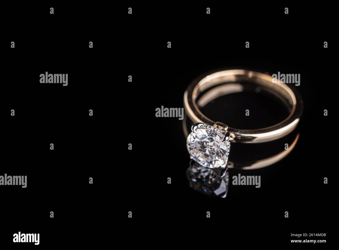 Solitaire Wedding Ring With Diamond on Reflected Background Stock Photo ...