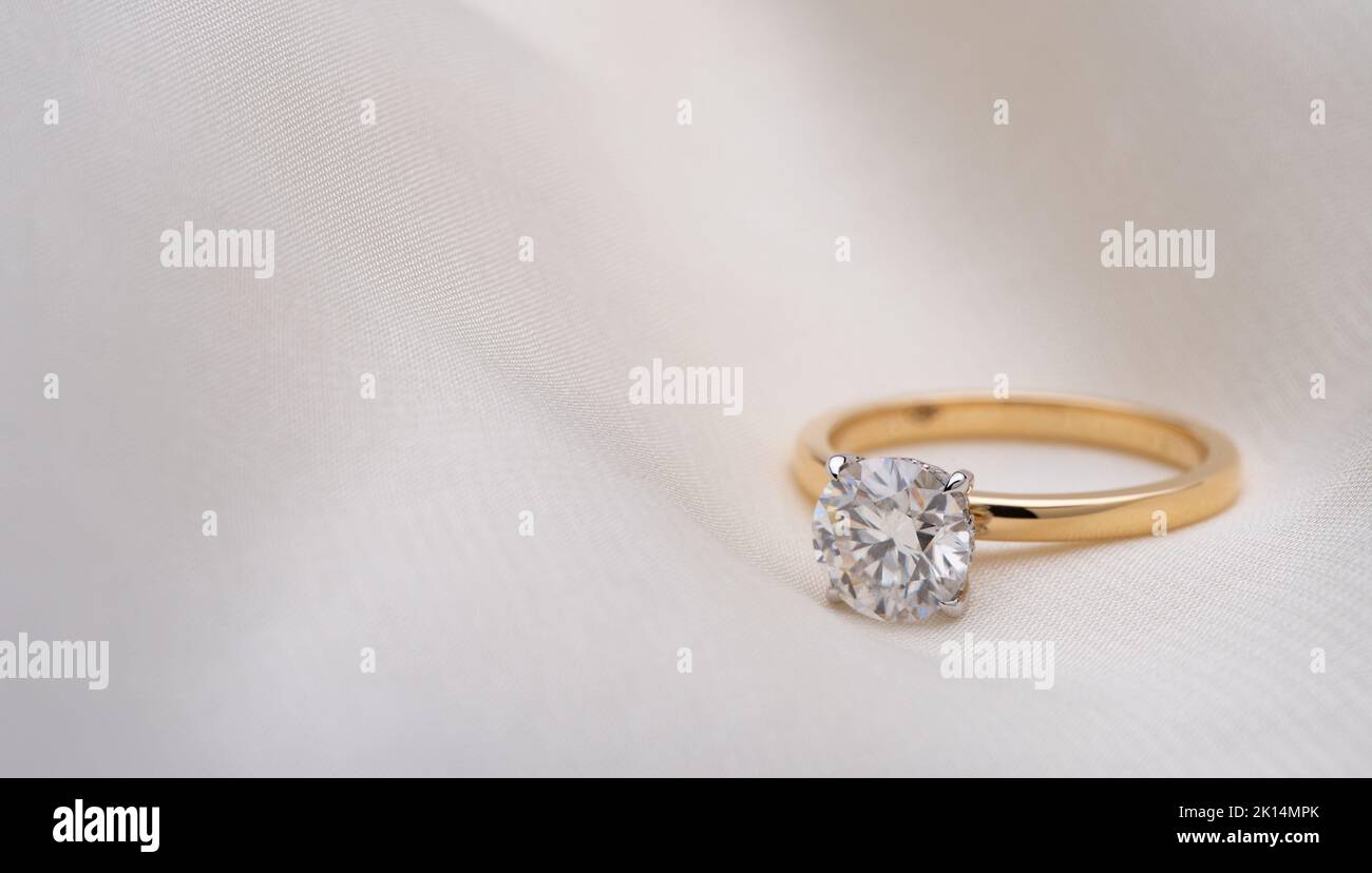 Golden Wedding Ring With Diamond on White Soft Background Stock Photo ...