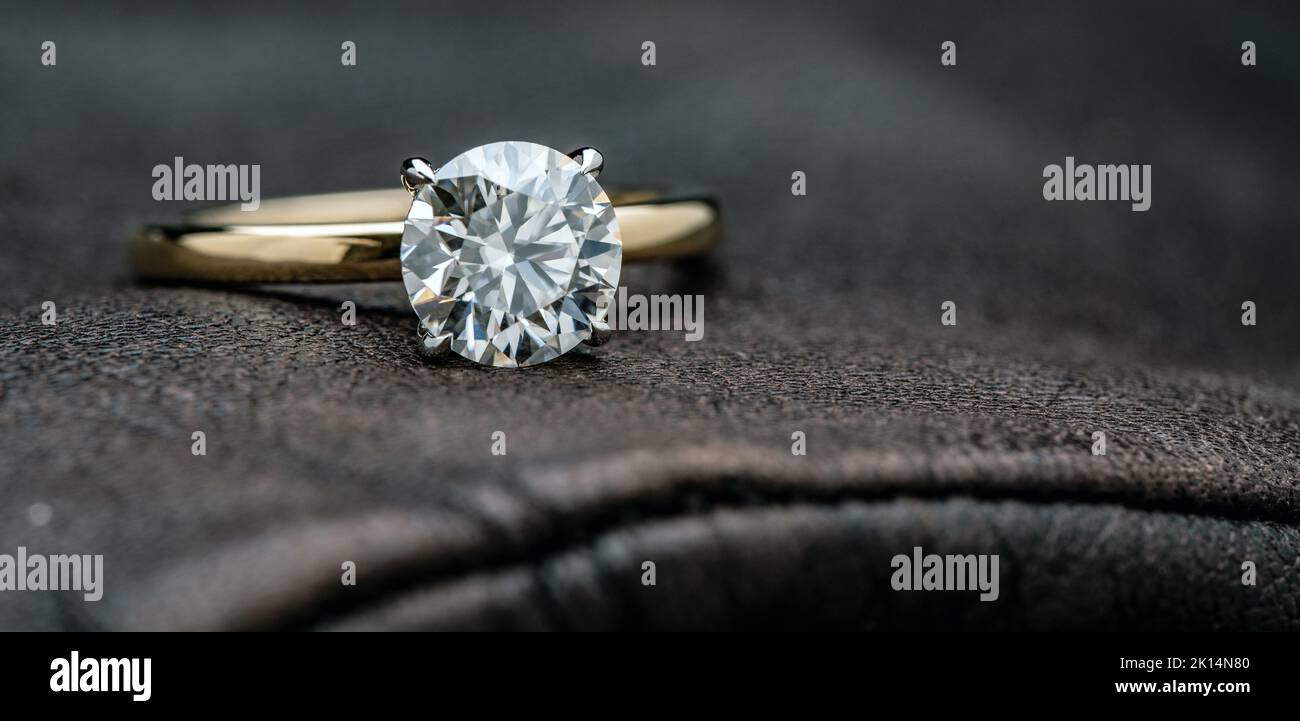 Gold Engagement Wedding Ring With Diamond Stock Photo - Alamy