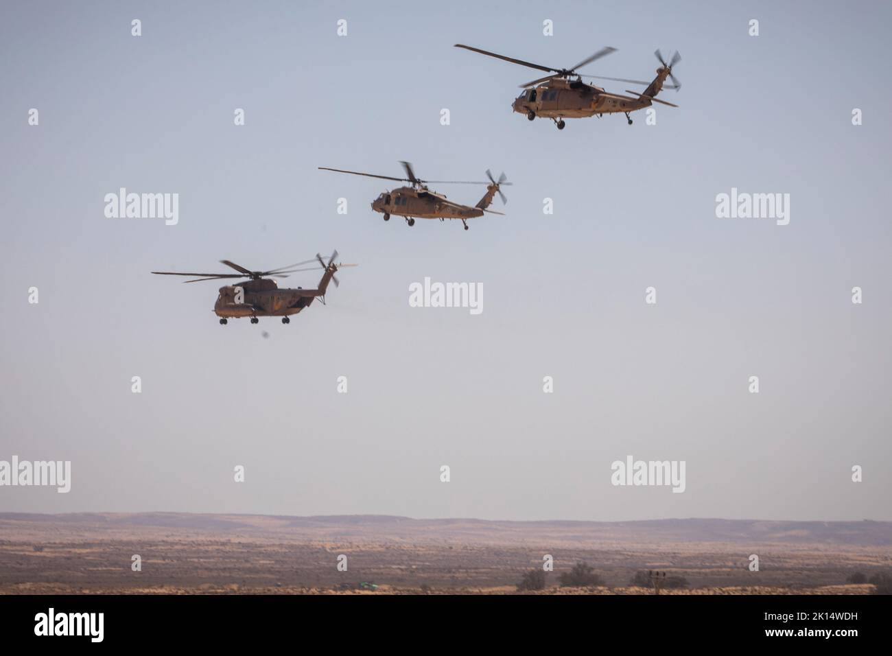 15 September 2022, Israel, Tze'elim: Israeli military helicopters fly ...