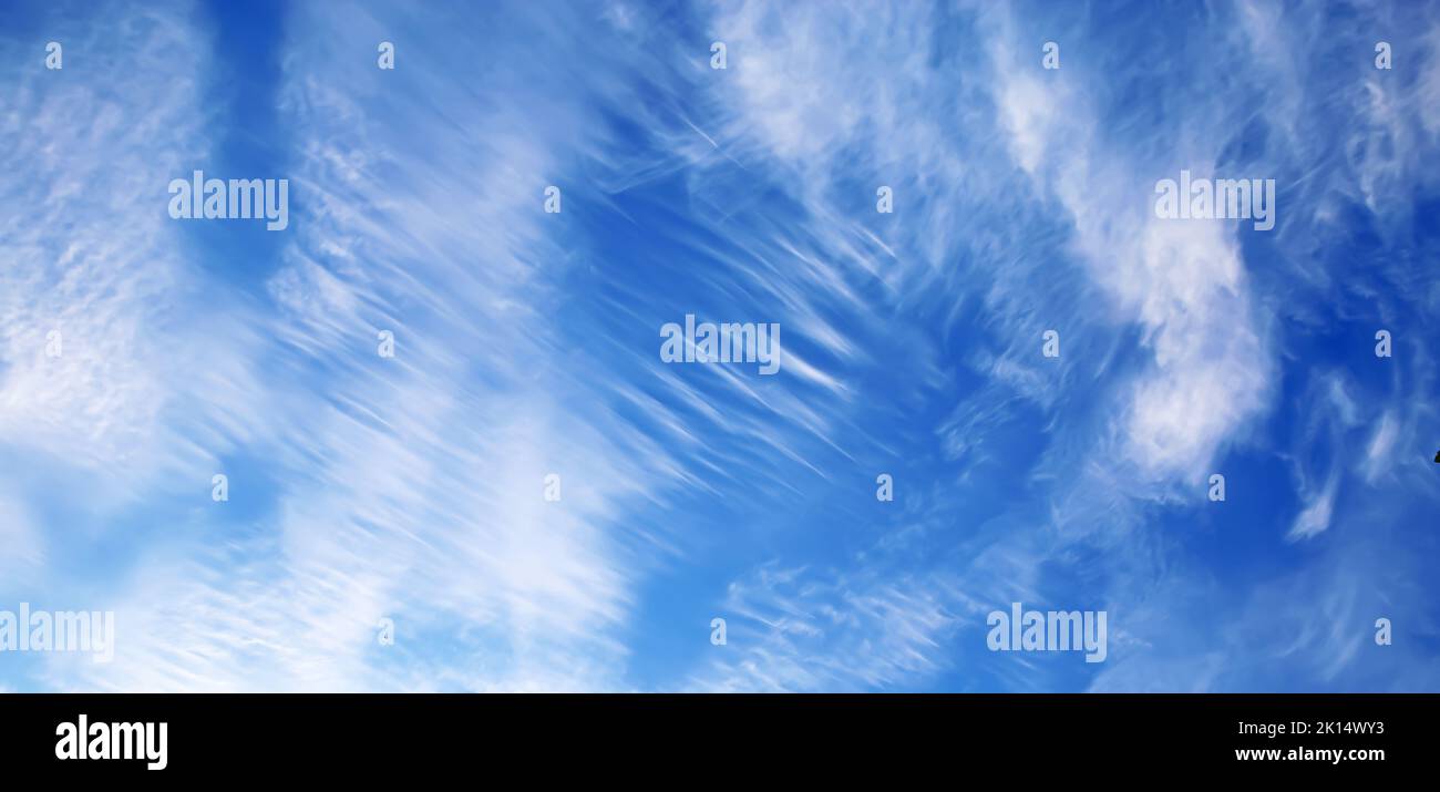 Isolated beautiful clear blue summer sky cloudscape with different ...