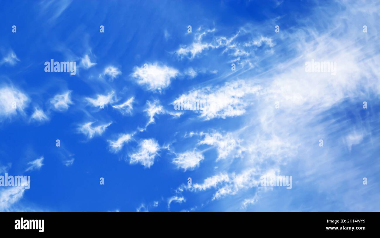 Blue clear summer sky isolated cloudscape, bright white cirrus floccus ...