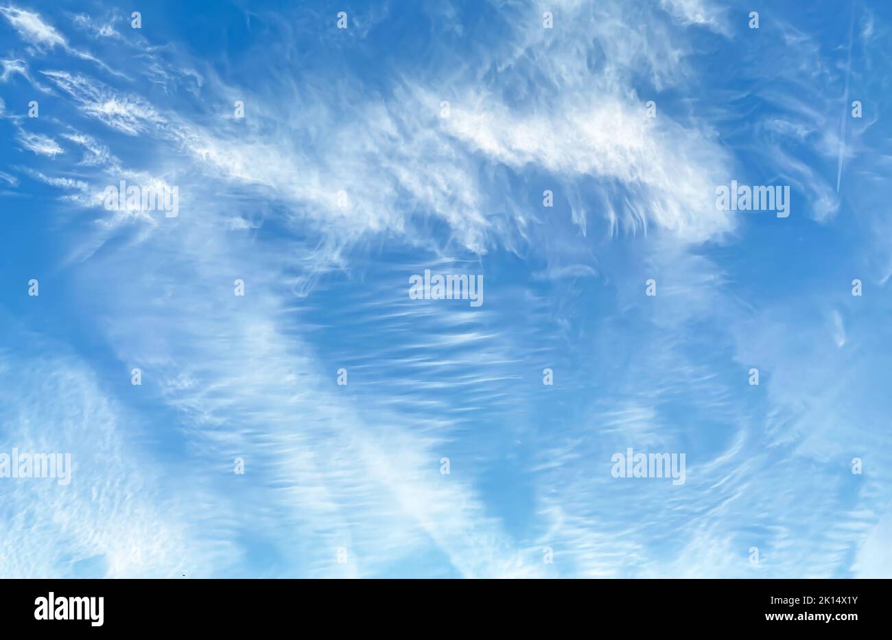Isolated beautiful cloudscape, clear blue summer sky, mix of different ...