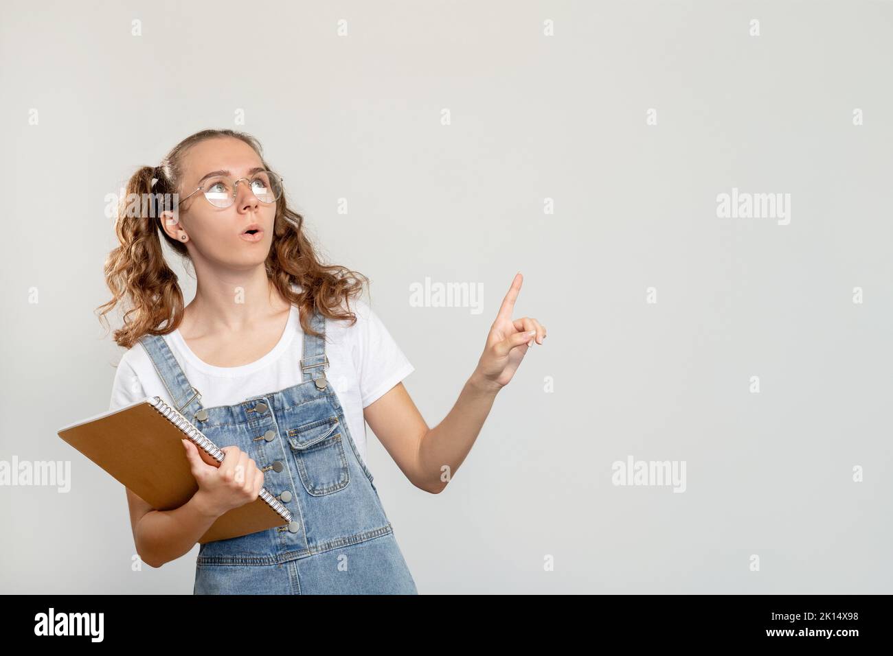 surprised student portrait course advertising girl Stock Photo - Alamy