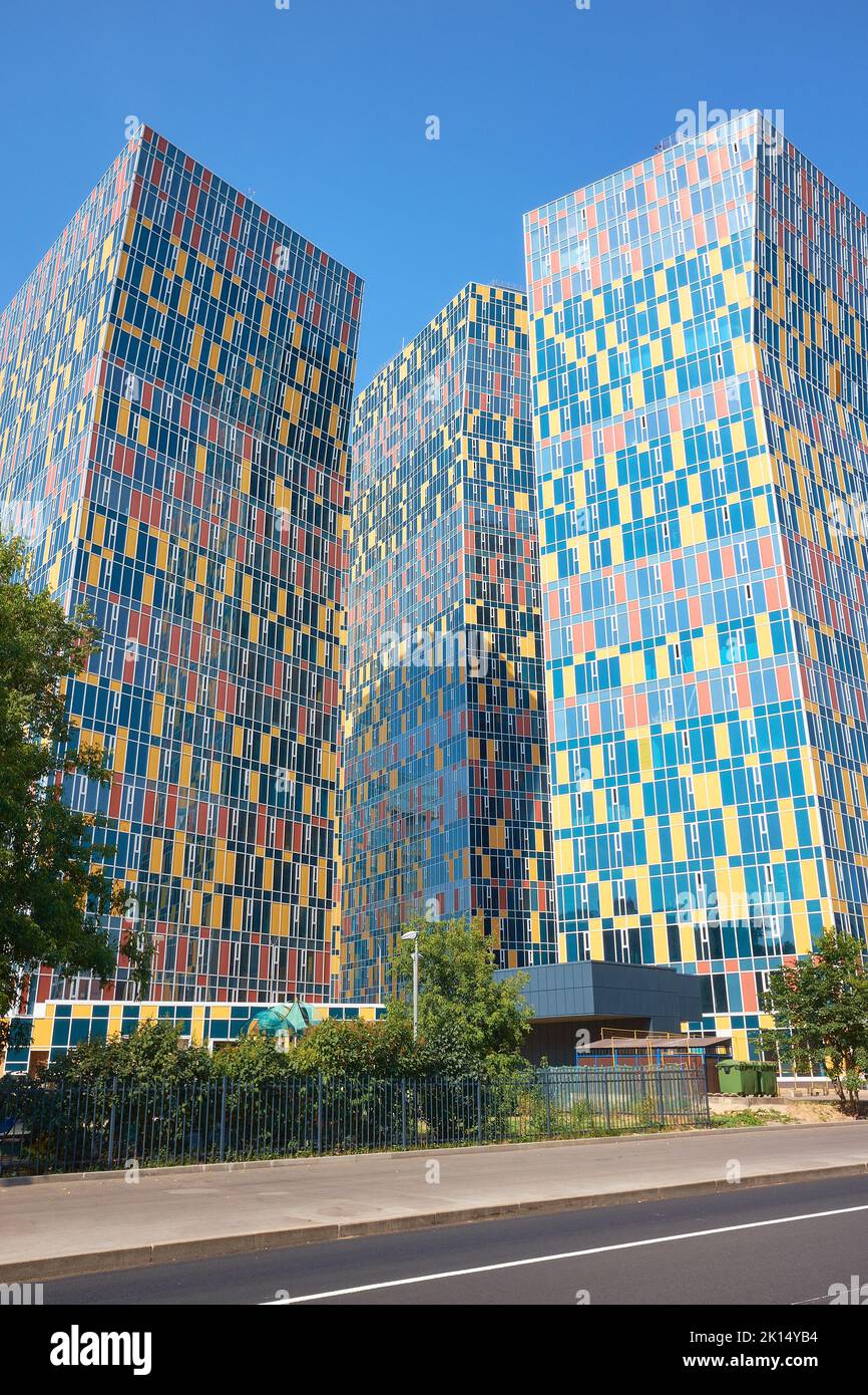 Mytnaya Street, view of the modern colorful towers of the Sky House ...