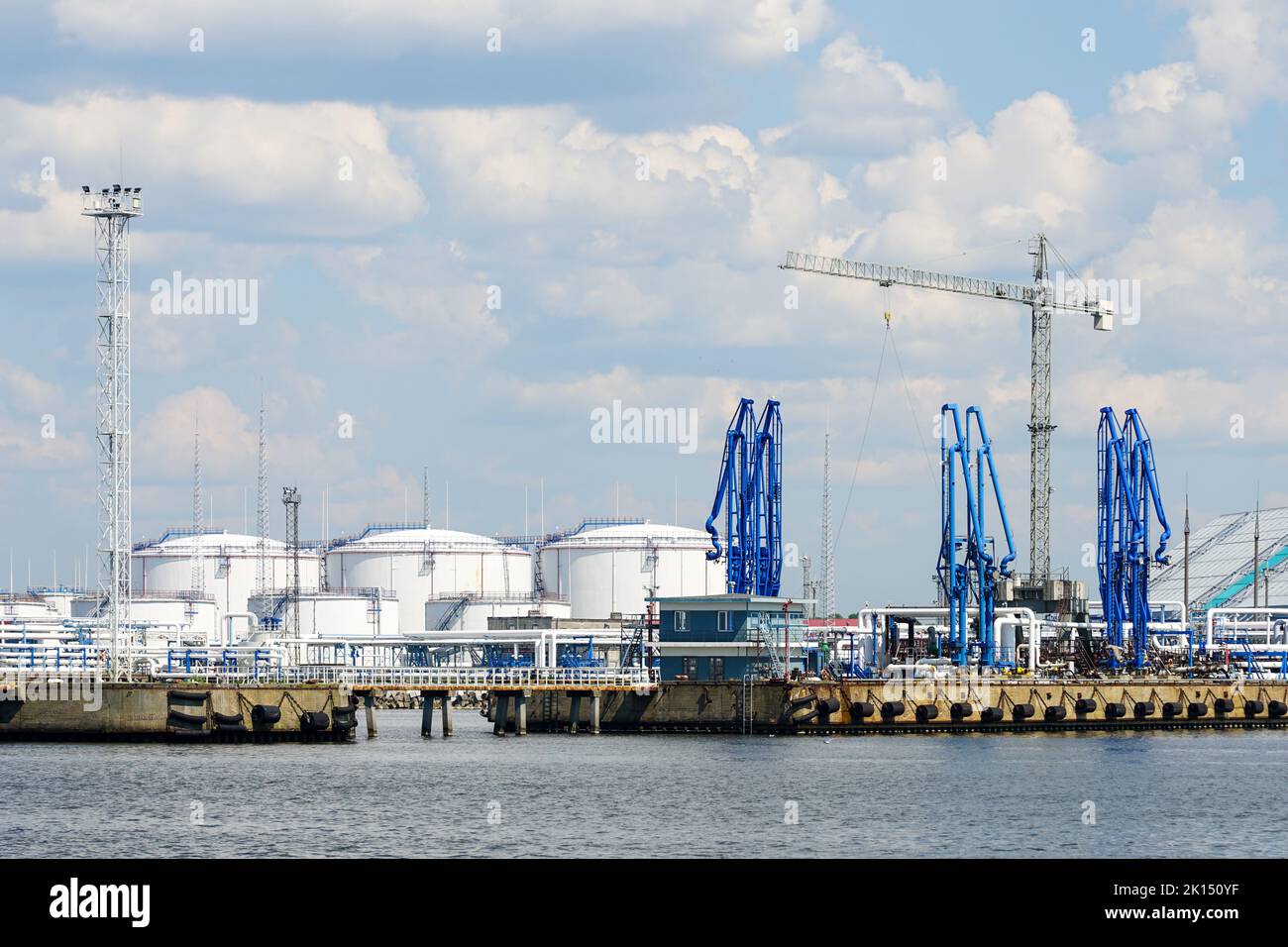A park of chemical product tanks in the port terminal with equipment ...