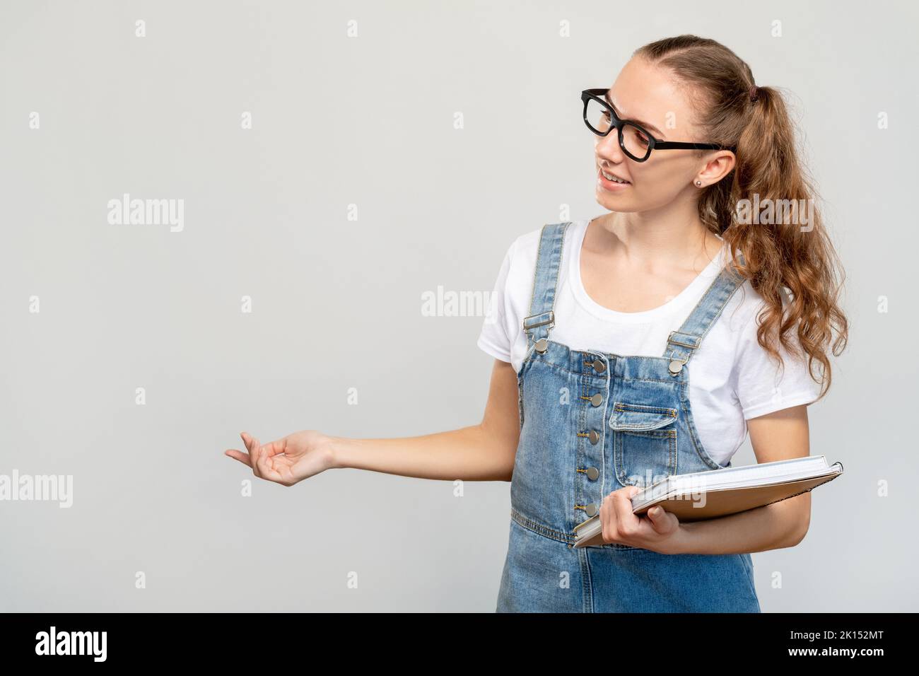 Curious student portrait. School lesson. Cheerful smart teen girl in ...