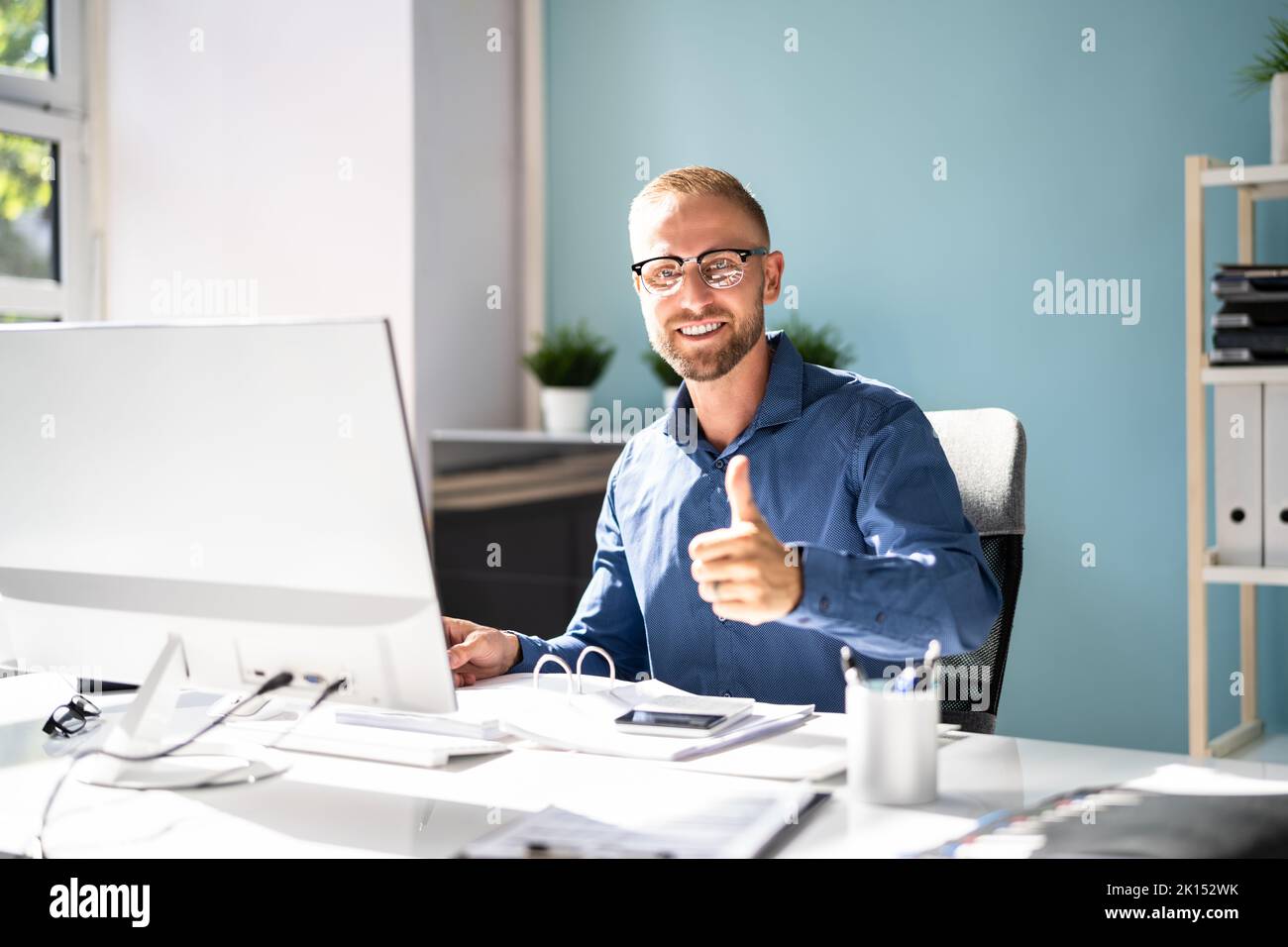 Professional bank man smiling hi-res stock photography and images - Alamy