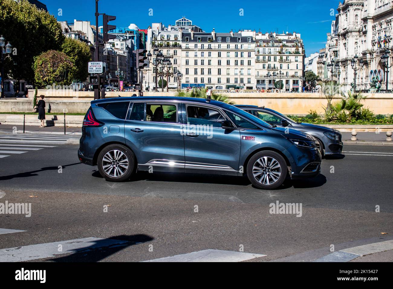Paris, France - September 14, 2022 Taxi driving through the streets of ...
