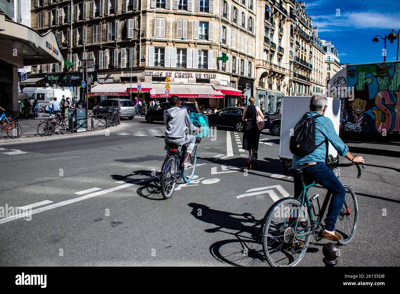 Paris, France - September 12, 2022 People cycling on the streets ...