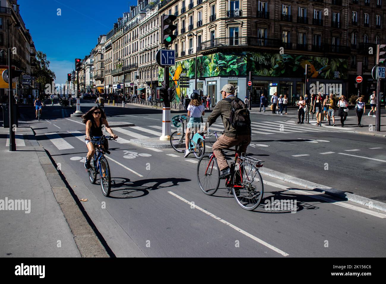 Paris, France - September 12, 2022 People cycling on the streets ...
