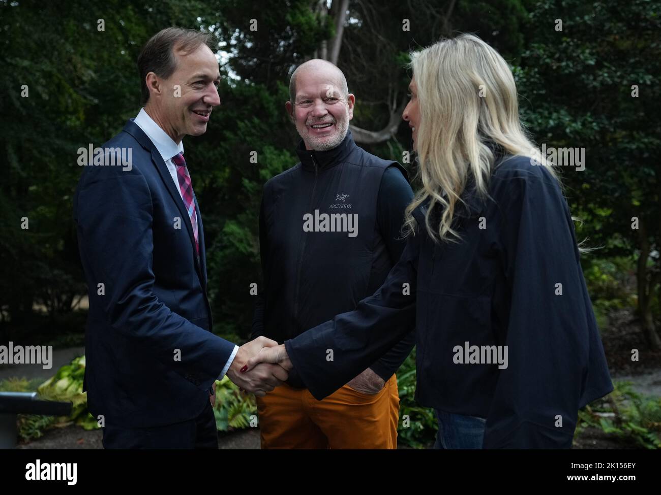 Lululemon founder Chip Wilson, centre, and his wife Summer Wilson talk ...